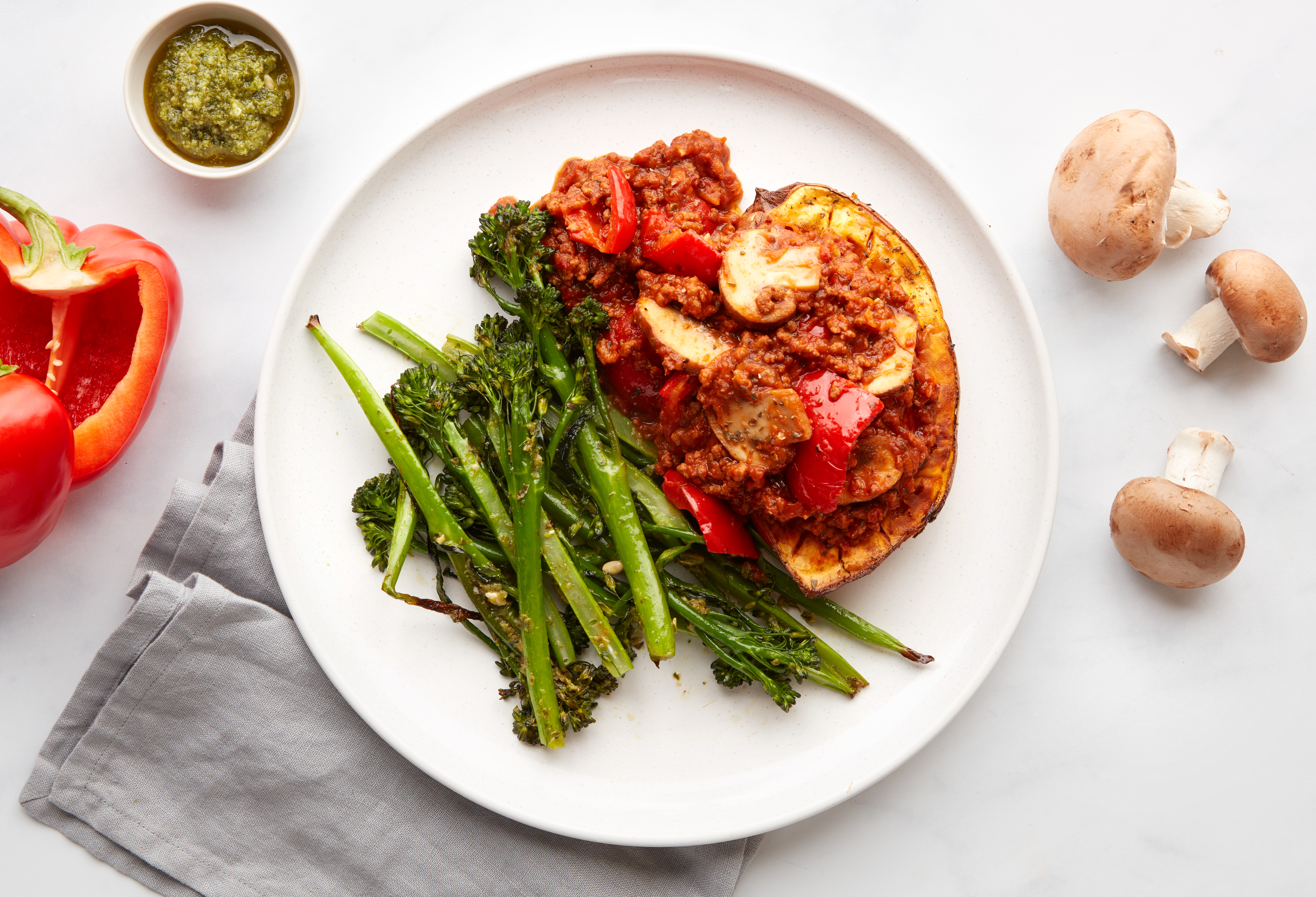 Sunflower 'mince' ragu stuffed sweet potato